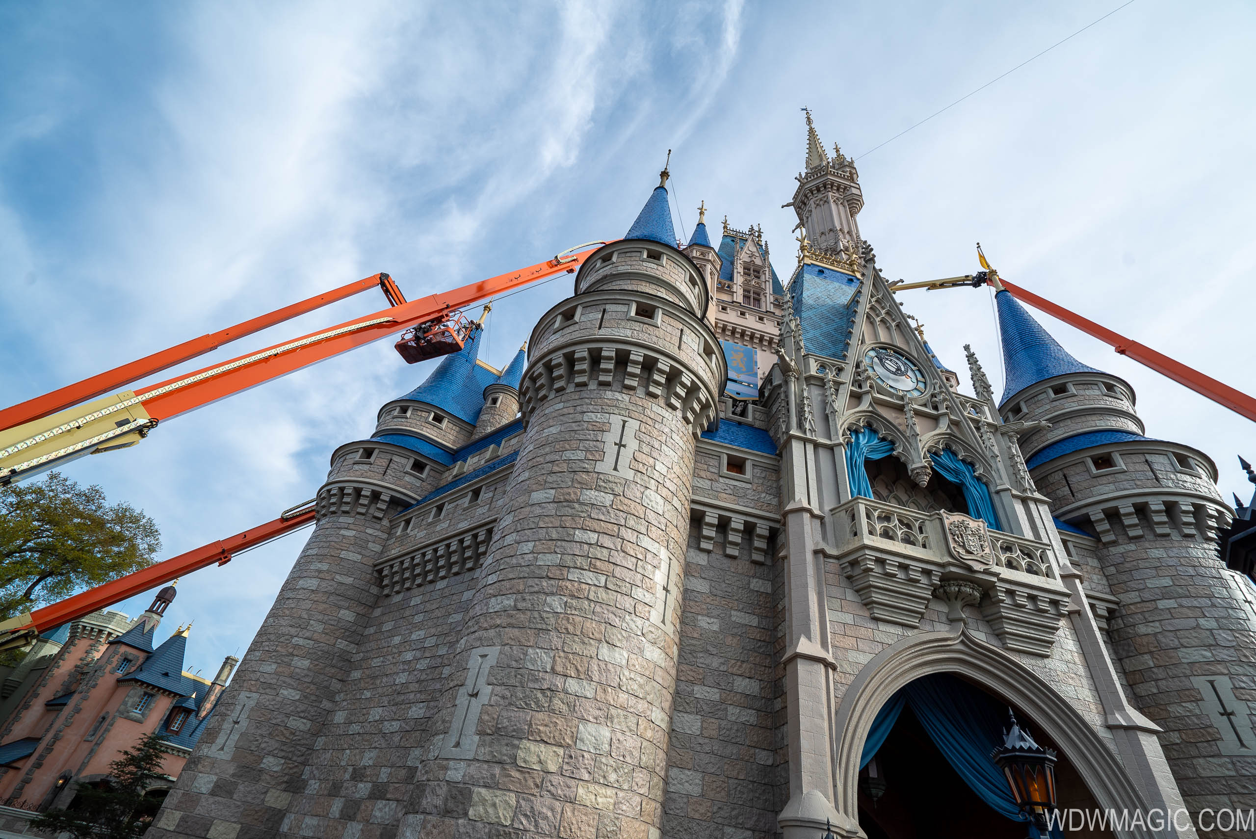 PHOTOS - Cinderella Castle's new paint scheme begins to take shape at ...