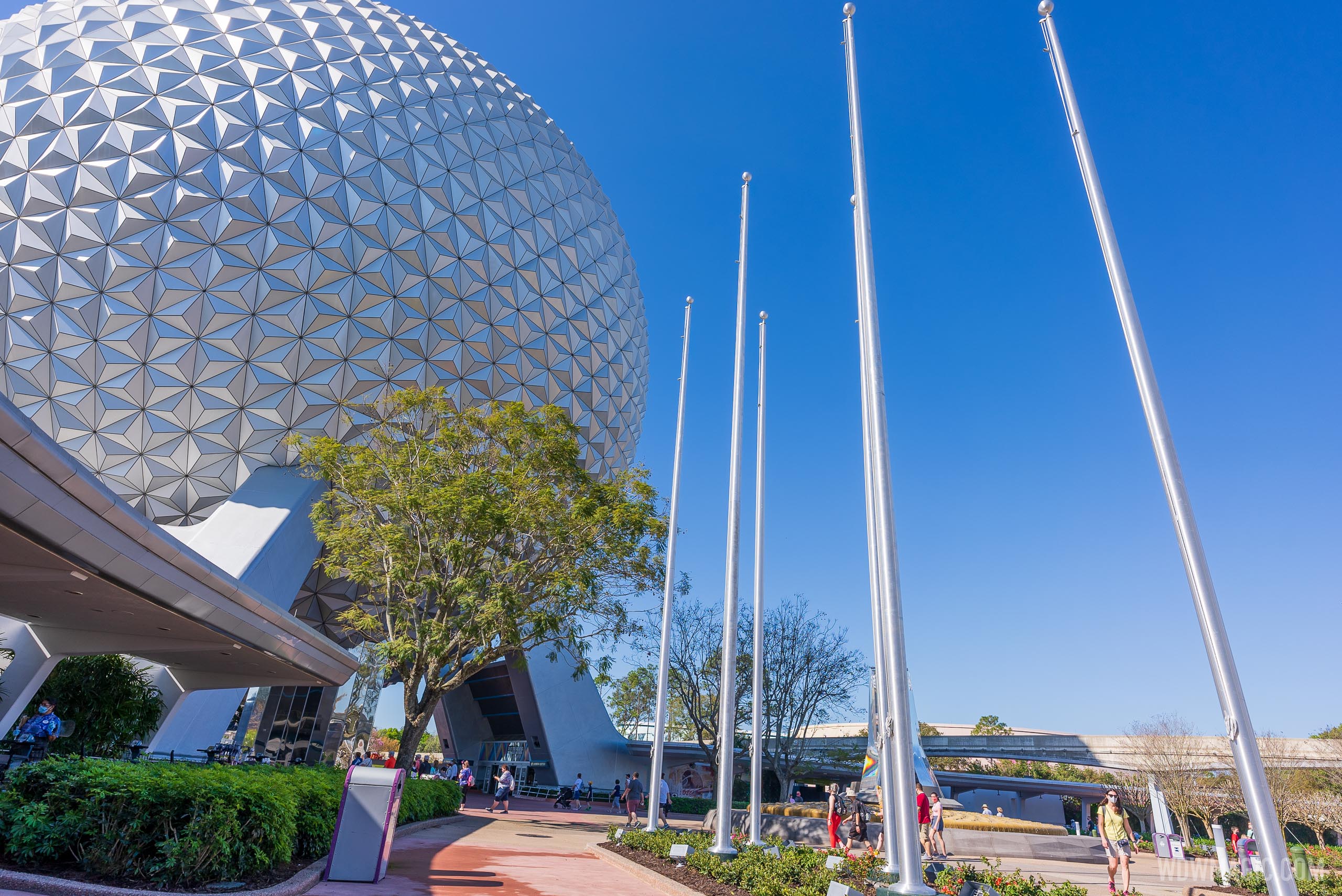 PHOTOS - First 6 flag poles installed on the east side of the new EPCOT ...