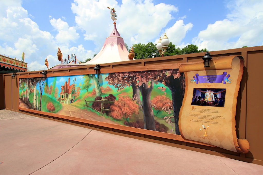 Fantasyland expansion construction walls decorated with large scale ...