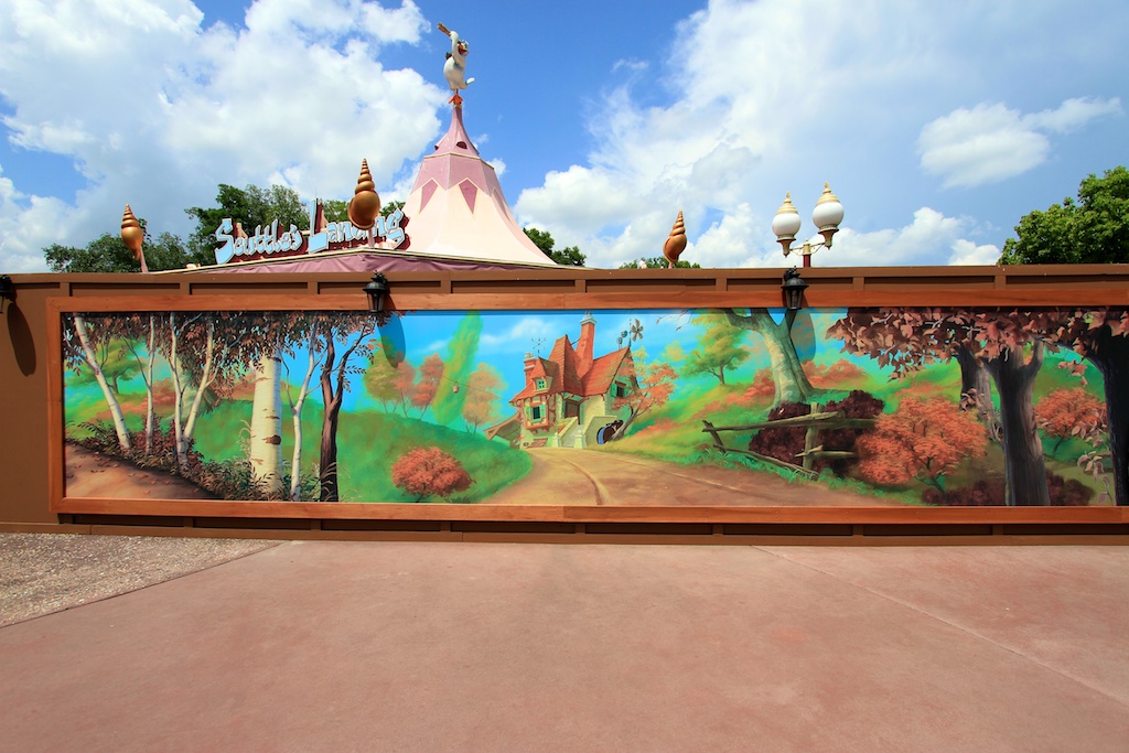 Fantasyland expansion construction walls decorated with large scale ...