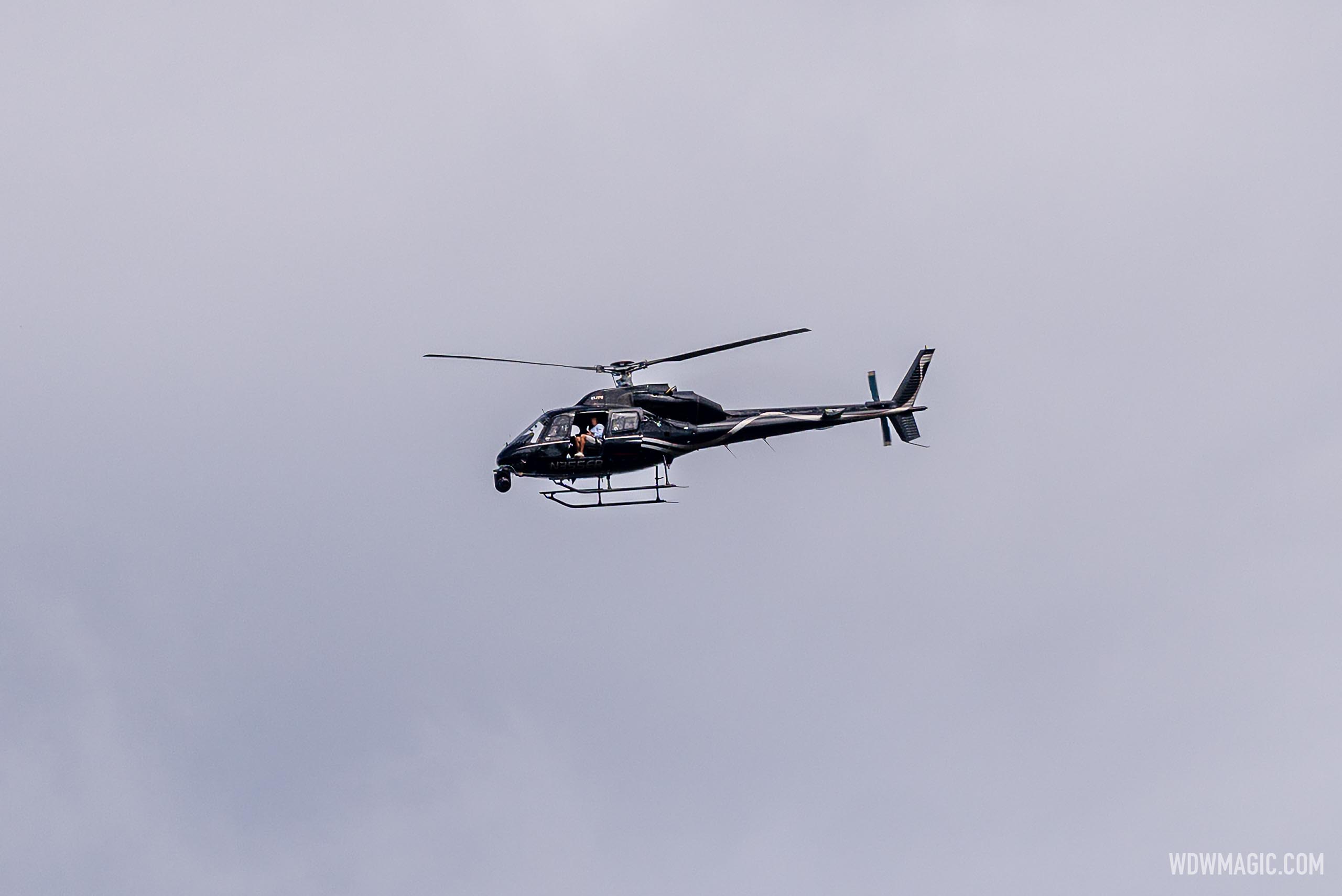 Disney Helicopter Flies Over Magic Kingdom for Promo Shoot - Photo 4 of 4