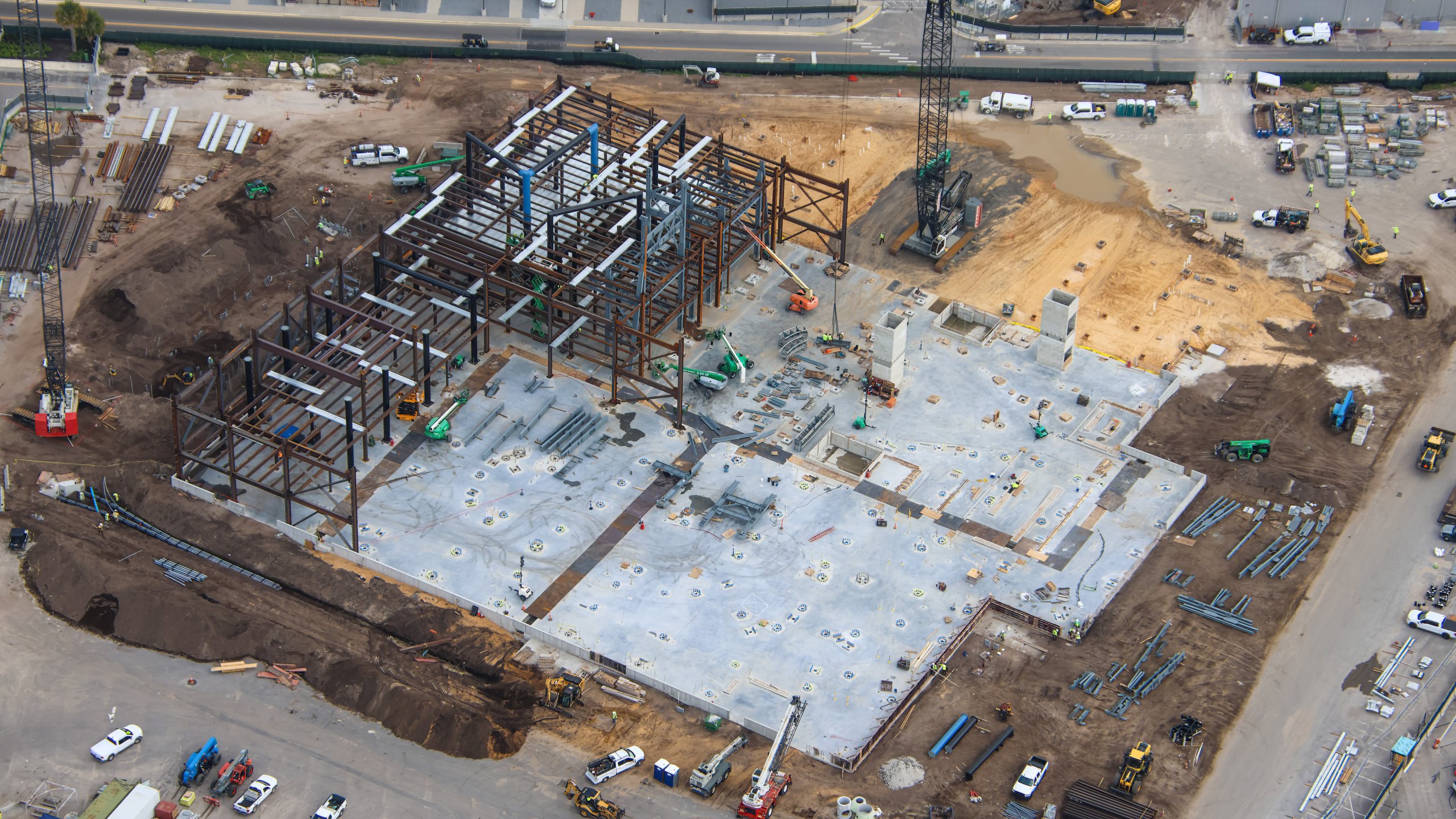 New Aerial Photos Show Monsters Inc Door Coaster Building Taking Shape ...
